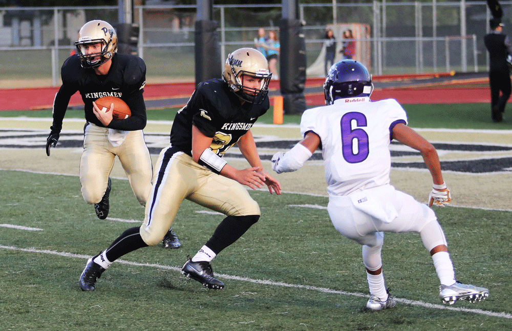 Ryan Lynch advances up field as Ryan Whiteman blocks - Penn-Harris ...